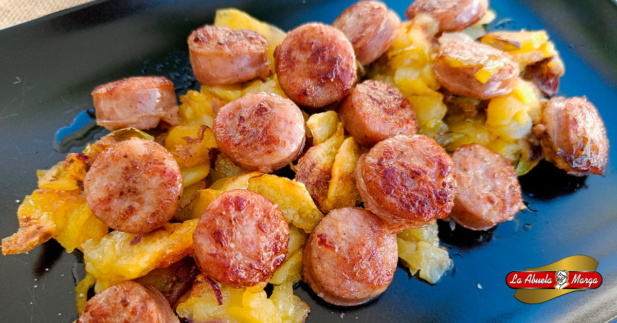 Chorizo criollo al horno con patatas: rebañarás hasta el plato